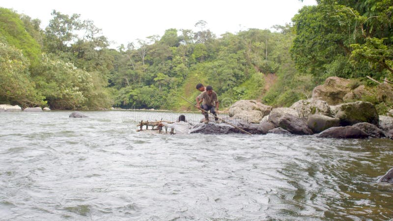 Sinking of indigenous raft stock video. Video of hunting - 158937319