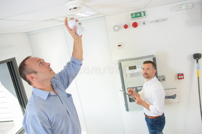 Testing the smoke detector stock image. Image of smoke - 128018915