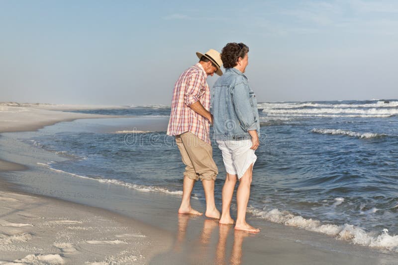 Testing the Water at the Beach Stock Photo - Image of surf, waterfront ...