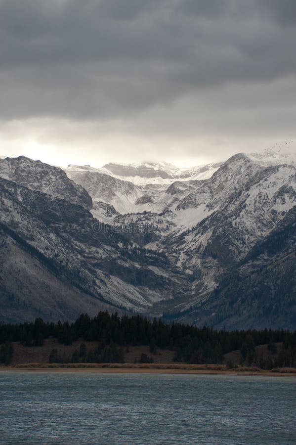 Tetons and Jackson Lake stock image. Image of peak, scenery - 12642777