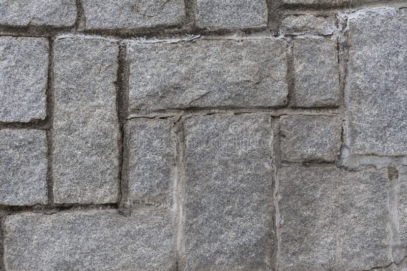Tetris Style Granite Block Wall Stock Image - Image of tile, outdoors ...