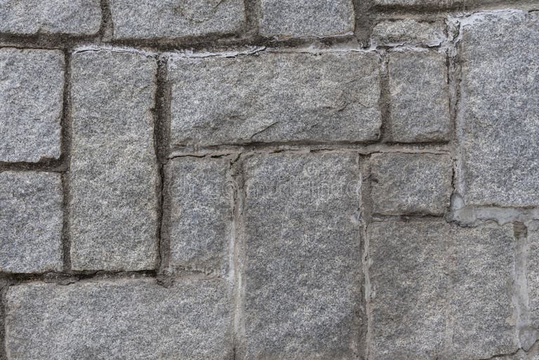 Tetris Style Granite Block Wall Stock Image - Image of tile, outdoors ...