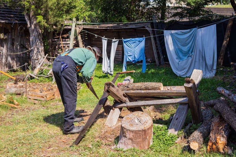 Old Man Cutting Wood in Old City Park Editorial Photo - Image of ...