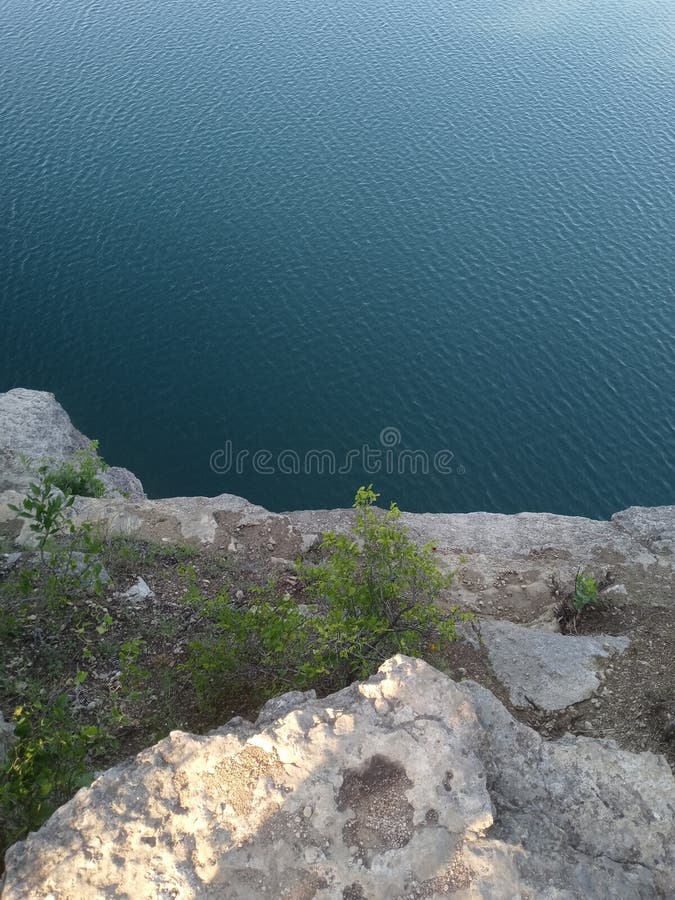 Texas park cliff and water stock photo. Image of park - 226720010