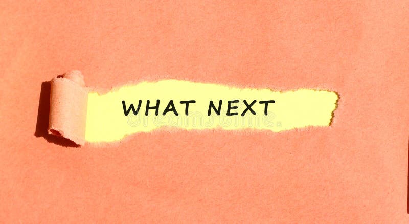 The Text Appearing on Yellow Paper Behind Torn Color Paper. Stock Photo ...