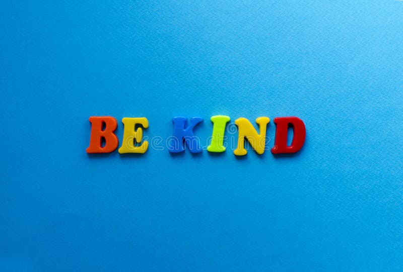 Text Be Kind from Plastic Colored Letters on Blue Paper Background ...