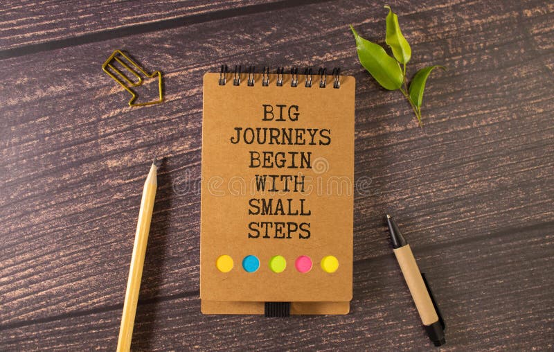 Text Big Journeys Begin with Small Steps on Note Paper Stock ...