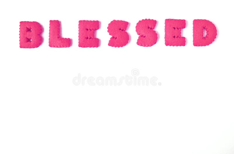 Text BLESSED Spelled with Pink Alphabet Shaped Cookies on White ...
