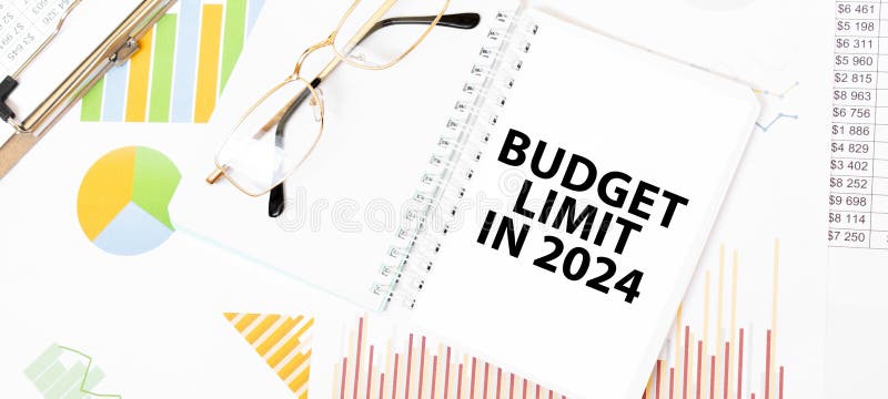 Text BUDGET LIMIT 2024 on White Notepad, Glasses, Graphs and Diagrams ...
