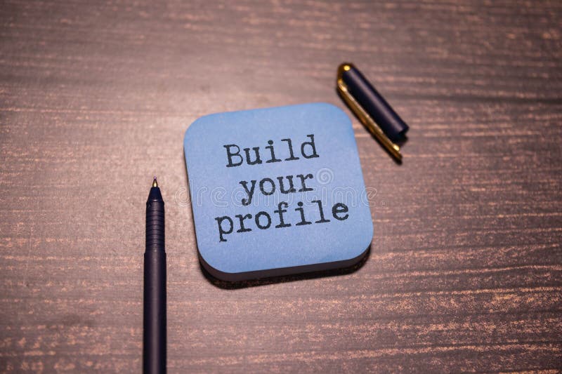 Text Build Your Profile on Torn Paper, Business Concept Stock Image ...