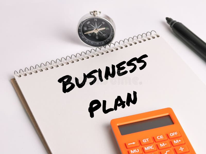 Text BUSINESS PLAN on Notebook with Marker Pen,calculator and Compass ...