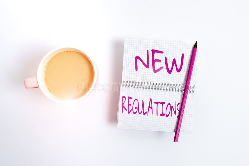 Writing Displaying Text New Regulations. Business Concept Rules Made ...