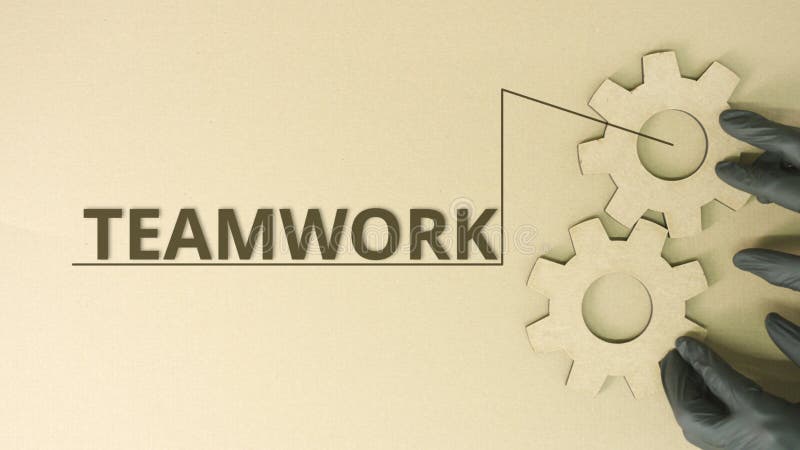 Cardboard Cog Wheels and Teamwork Text on the Table Stock Image - Image ...