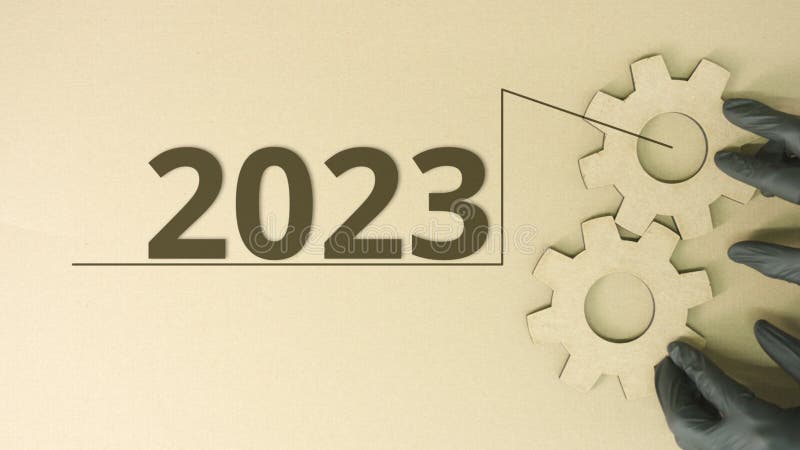 Cardboard Cog Wheels and 2023 Text on the Table Stock Image - Image of ...