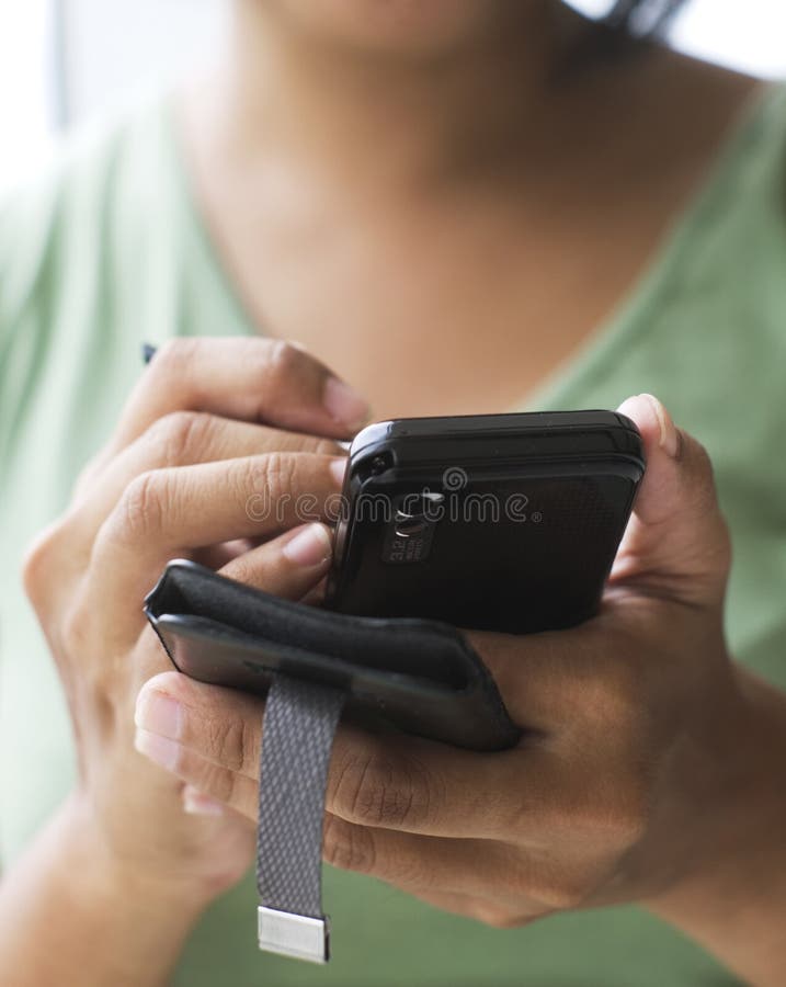 Text on cell phone stock photo. Image of cellular, holding - 16118152