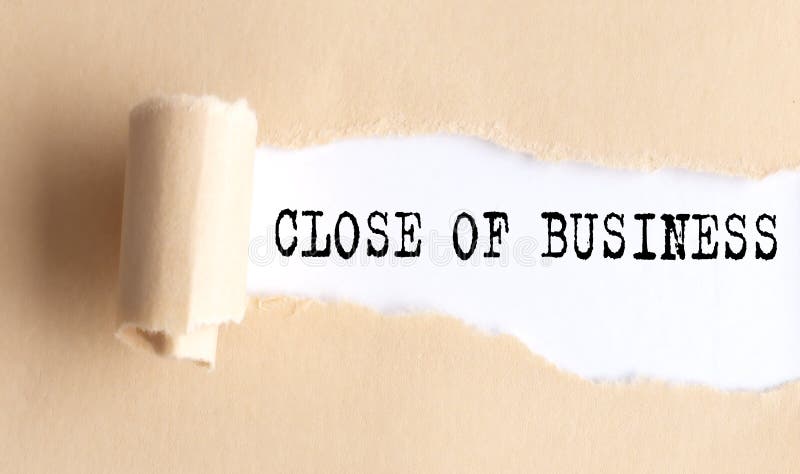 The Text CLOSE of BUSINESS Appears on Torn Paper on White Background ...