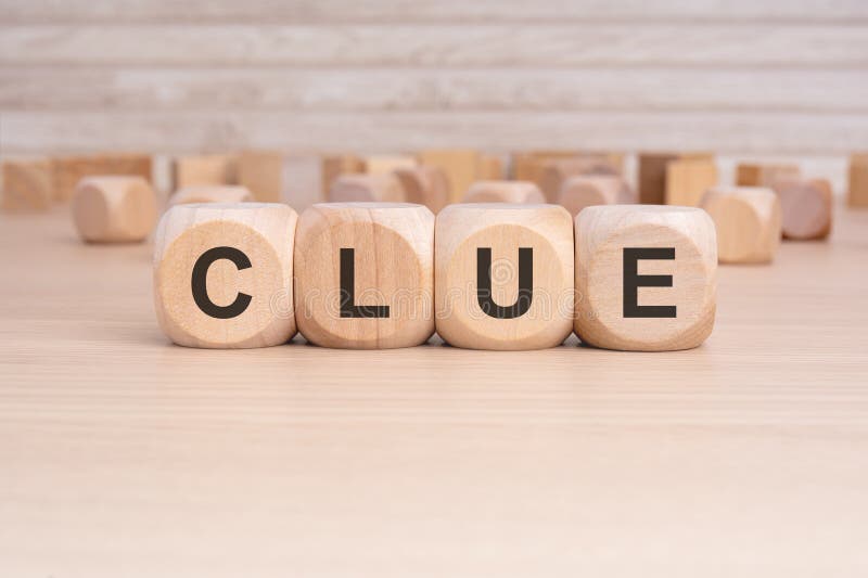 The Text Clue is Written on Wooden Cubes on a Brown Background Stock ...
