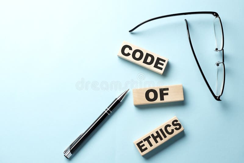 Text CODE of ETHICS Concept on Wooden Block on the Blue Background ...