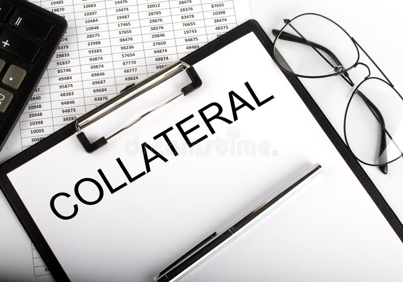 Text COLLATERAL on Office Desk Table with Paper, Supplies,analysis ...