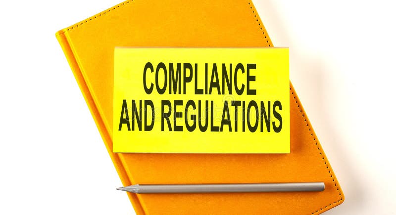 Text Compliance and Regulations on the Sticker on the Yellow Notebook ...