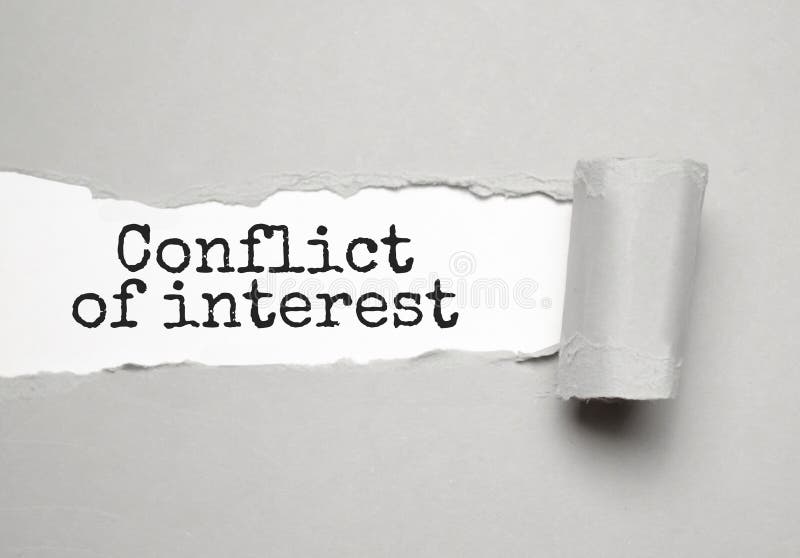 The Text Conflict of Interest Appearing Behind Torn Brown Paper Stock ...