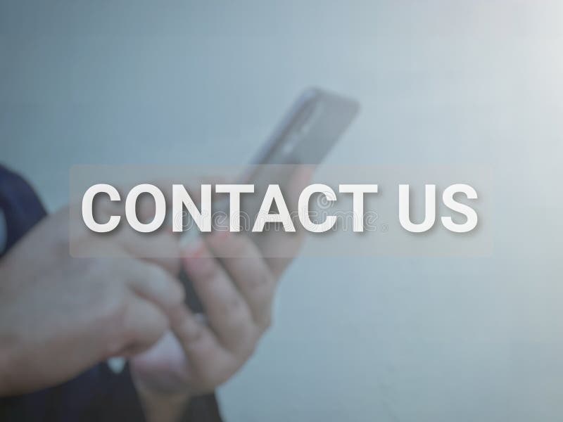 Text CONTACT US NOW Written on Brown Paper Note on Computer Keyboard ...