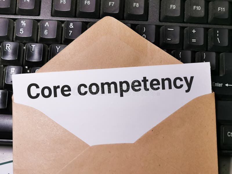 Text CORE COMPETENCY Written on White Paper Note in the Envelope on ...
