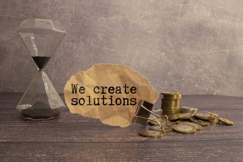 Text Text we Create Solutions Appearing Behind Torn Brown Paper. Stock ...