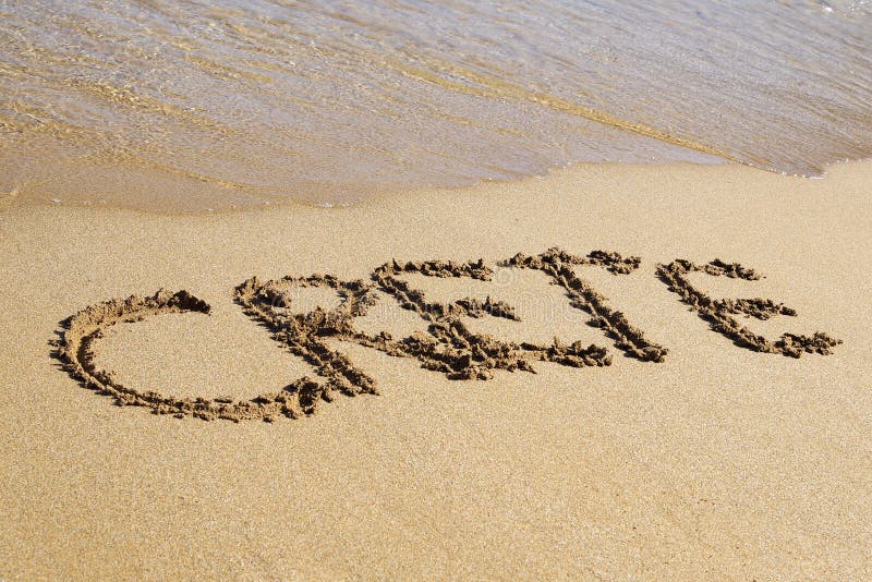 Text CRETE written in sand stock image. Image of water - 102168757