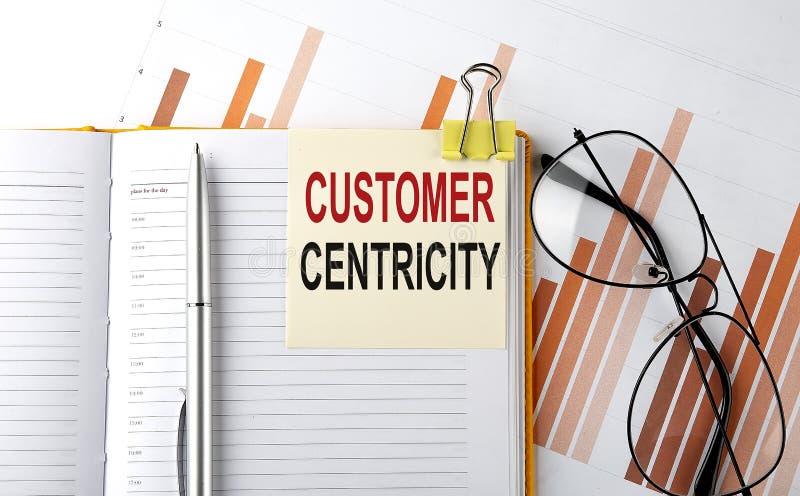 Text CUSTOMER CENTRICITY on Sticker on the Notepad on the Diagram ...