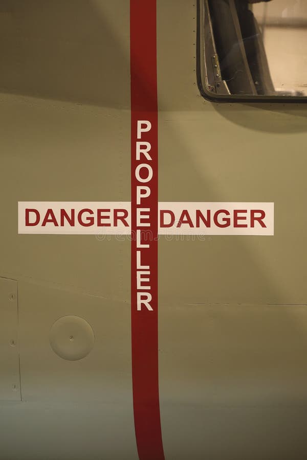The Text Danger Propeller on the Side of an Old Airplane Stock Image ...