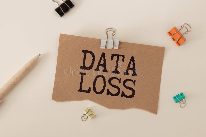 Text DATA LOSS on Tablet Display in Businessman Hands on the White ...