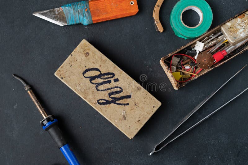 The Text of DIY Do it Yourself Sign on the Plate with Some Accessories ...