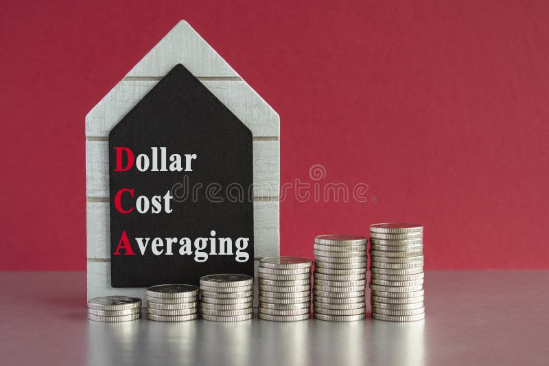 Text Dollar Cost Averaging Written on a Black Board. Silver Coins ...