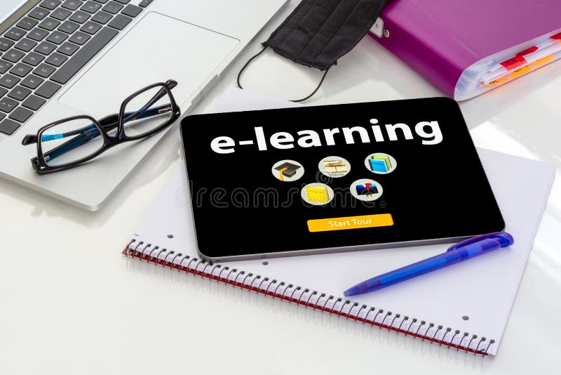 The Text E-LEARNING on a Tablet Next To a Mask Stock Photo - Image of ...