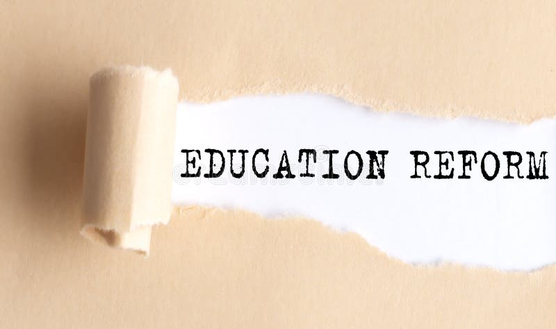 The Text EDUCATION REFORM Appears on Torn Paper on White Background ...