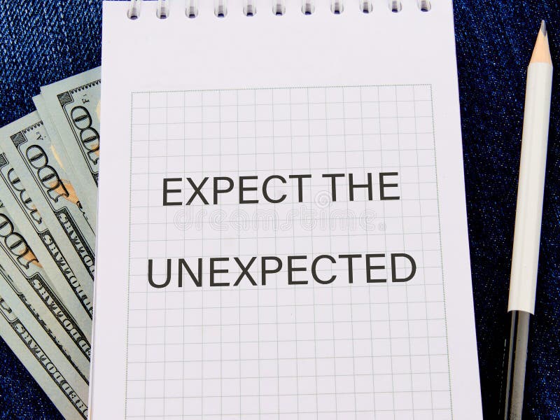 Text Expect the Unexpected in a Notebook in a Composition with American ...