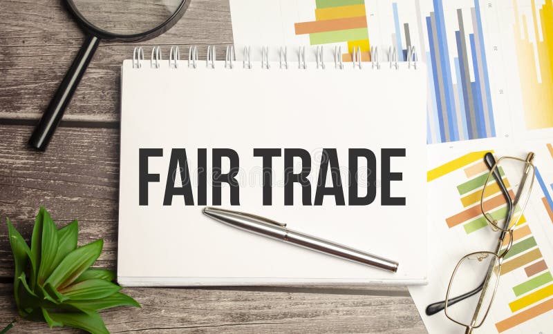 Text Fair Trade on a Notepad with Magnifier , Glasses and Pen Stock ...