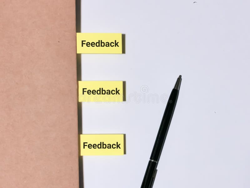 Text Feedback Written on Sticky Notes with a Pen and Note Book. Stock ...