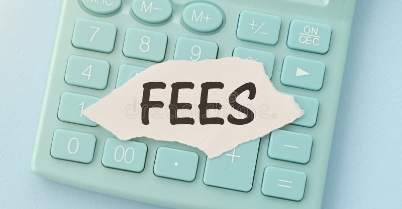 Text FEES on Paper on Calculator,financial Documentation on the Table ...