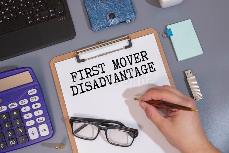 Text First Mover Disadvantage on Torn Paper Stock Photo - Image of ...
