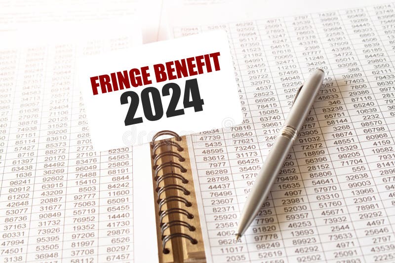 Text FRINGE BENEFIT 2024 on Paper Card, Pen, Financial Documentation on ...