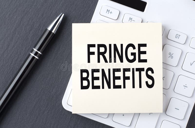 Text FRINGE BENEFITS on Sticker on the Calculator, Business Concept ...
