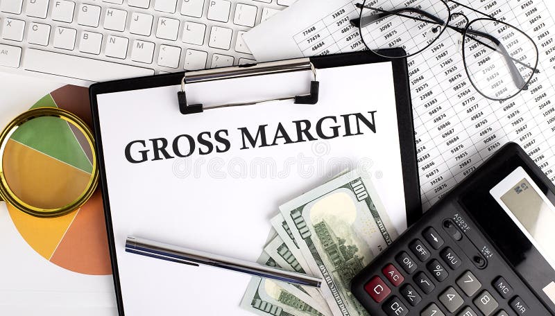 Gross Margin Word On Wooden Block. Flat Lay View On Blue Background ...