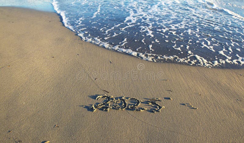 2025 Text Handwriting on the Sand in a Beach with a Wave Stock Image ...