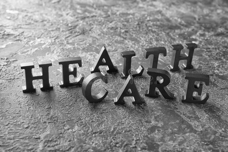 Text HEALTH CARE Made of Dark Letters on Grey Table Stock Photo - Image ...