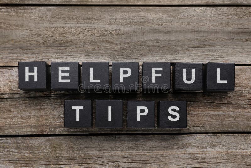 Text Helpful Tips Made of Black Cubes with Letters on Wooden Table, Top ...