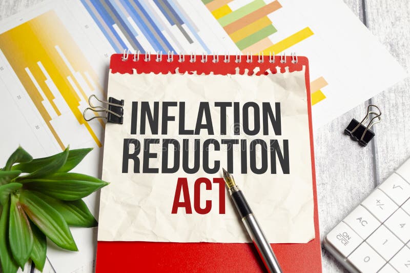 Text INFLATION REDUCTION ACT Text Written on Paper Folder and Charts ...