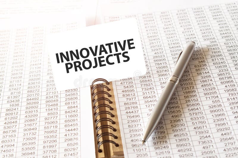 Text Innovative Projects on Paper Card, Pen, Financial Documentation on ...