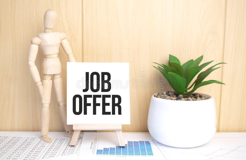 Text Job Offer on Easel with Office Tools and Paper.Top View Stock ...